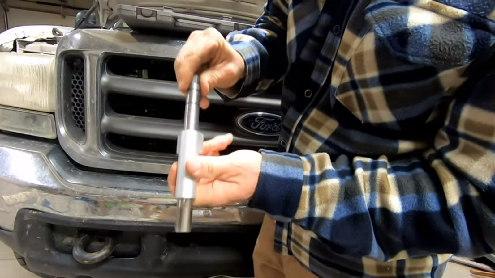 How Much Does It Cost to Fix a Blown Out Spark Plug? - CarProfy